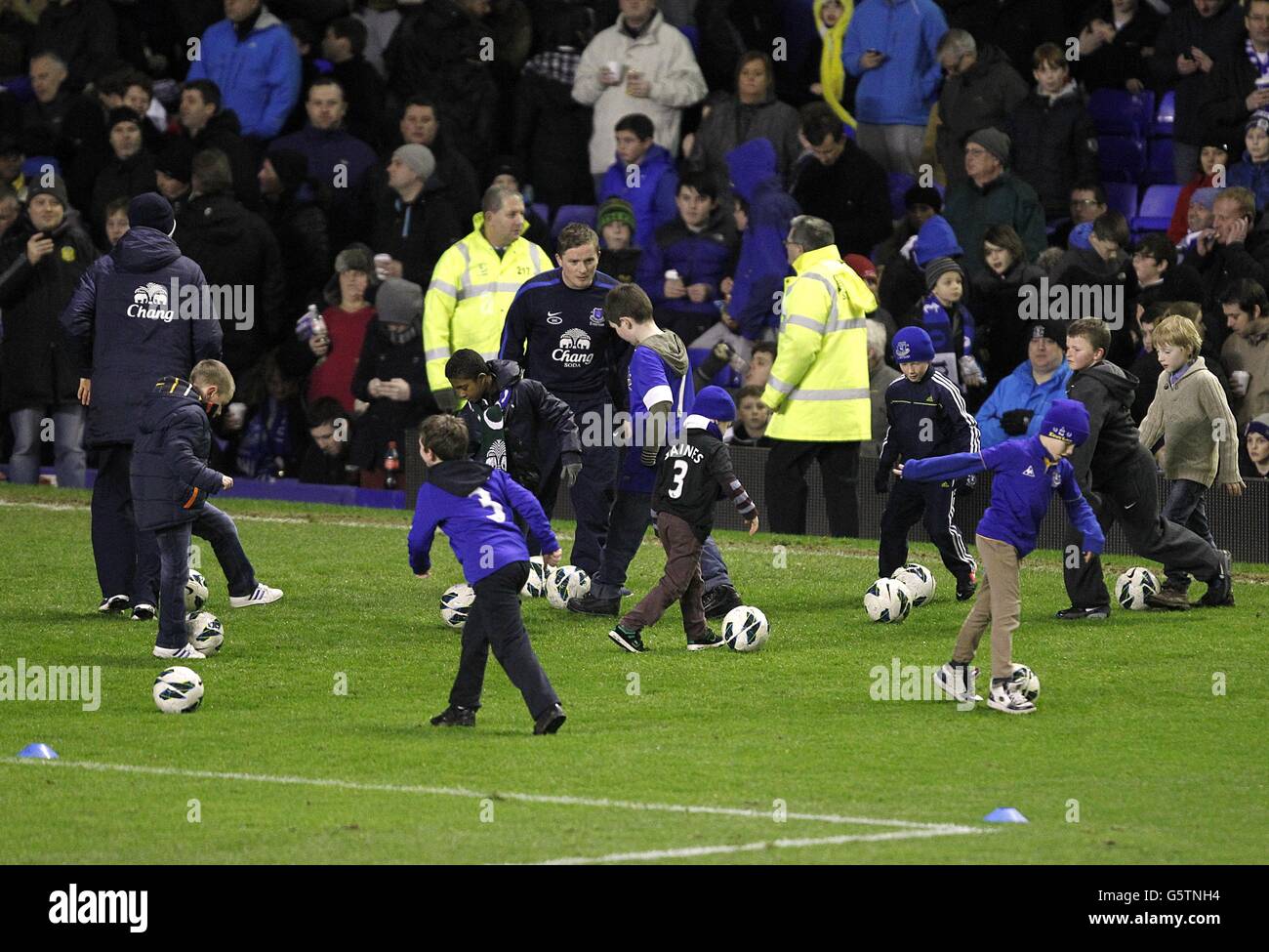 General view of a kids coaching session on the pitch at half-time Stock ...