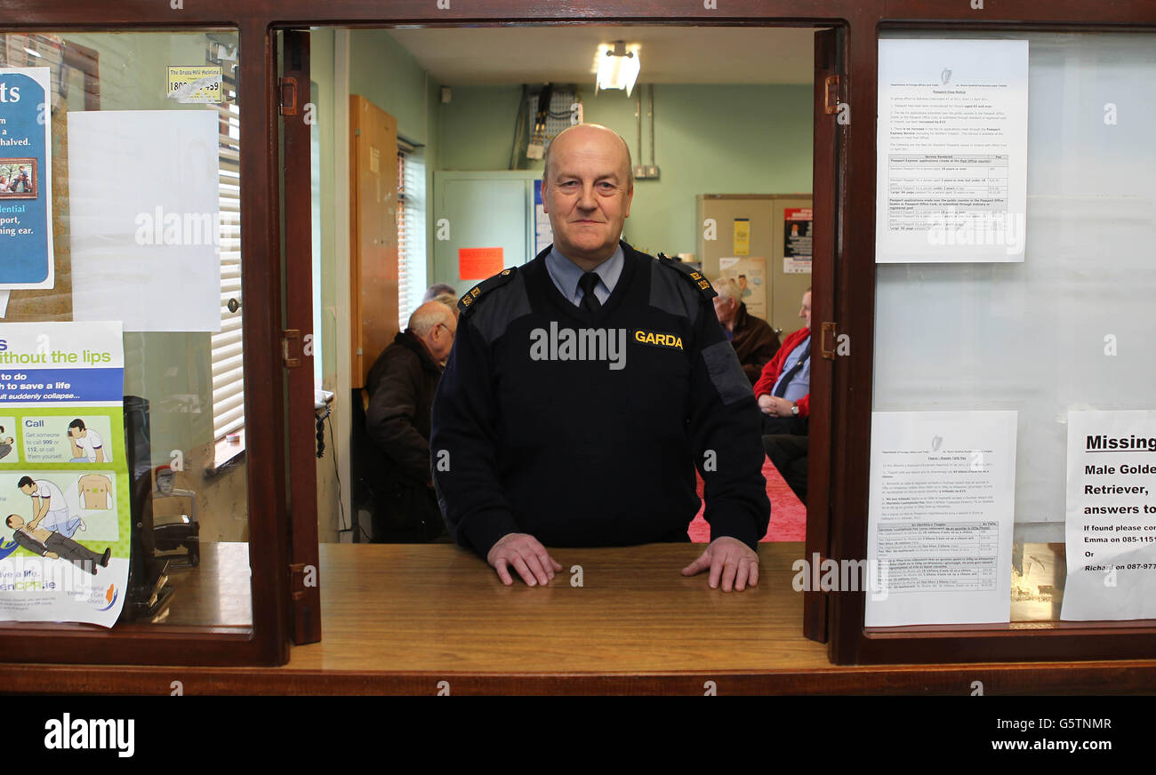 Garda Pat Murphy stands at the reception counter at Kill station ...