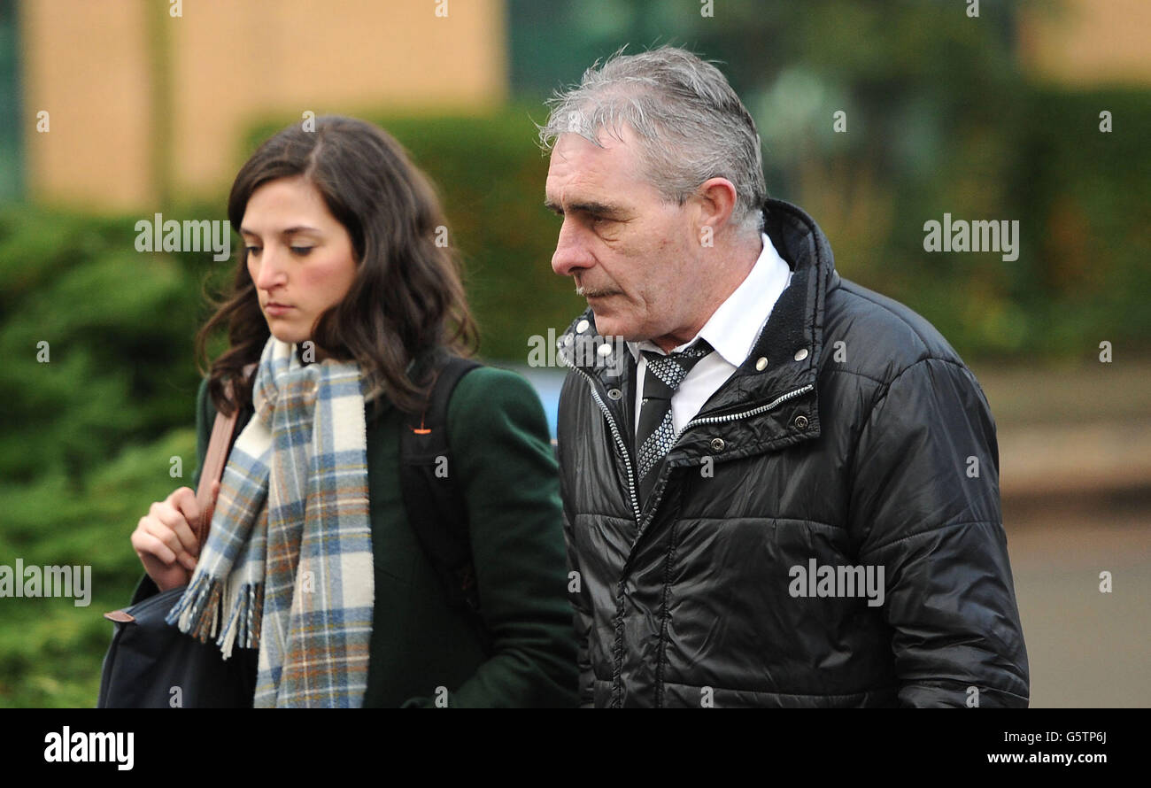 MNS Mining Director Gerald Ward (right) arrives with an unidentified ...