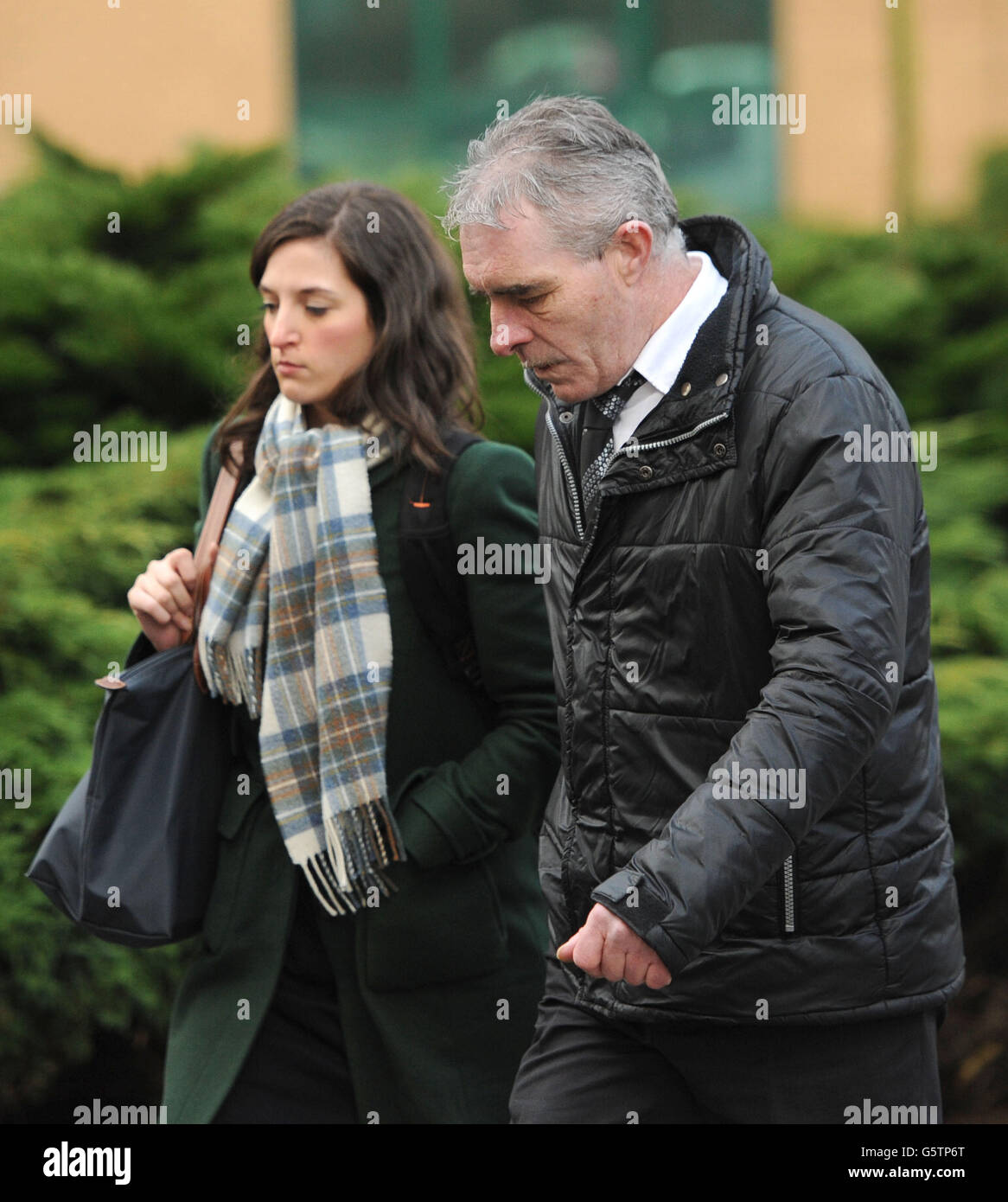 MNS Mining Director Gerald Ward (right) arrives with an unidentified ...