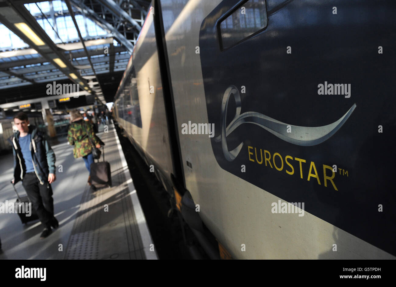 Passengers board paris bound eurostar train st pancras station hi-res ...