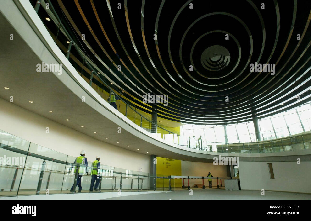 Construction work nears completion in the mirrored public exhibition ...