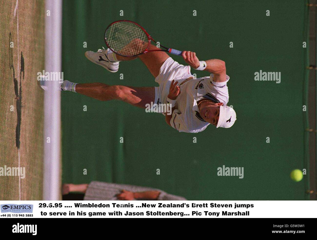 29-Jun-95. Wimbledon Tennis. New Zealand's Brott Steven jumps to serve ...