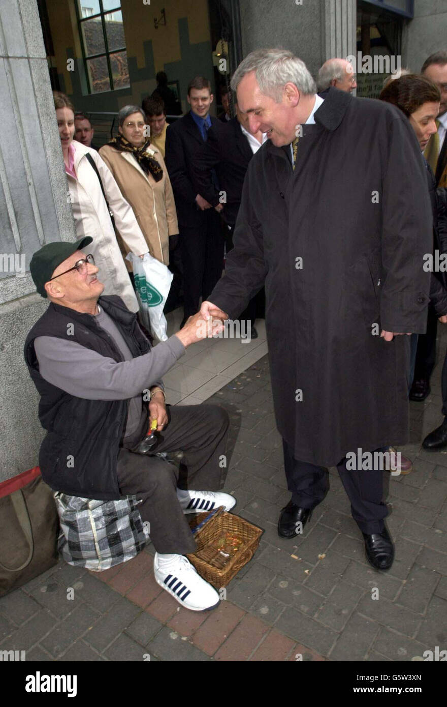 Politics shaking hands smiling bertieaherncollection hi-res stock ...