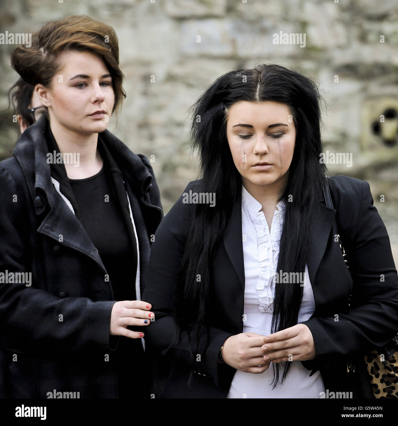 A mourners leave the funeral of jordan cobb hi-res stock photography ...