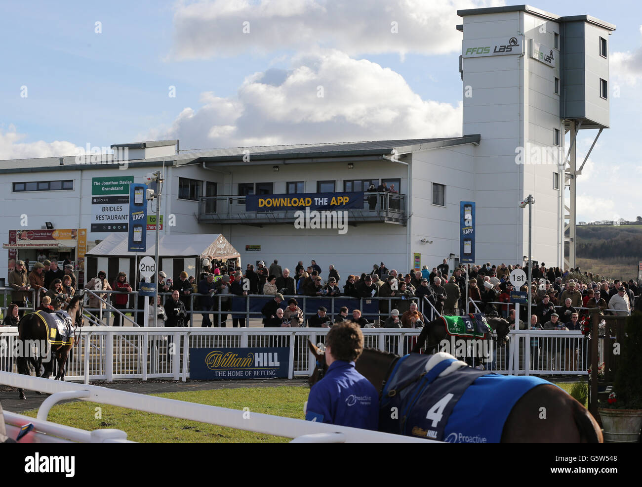 Horses parade around the ring before The William Hill Welsh Champion ...