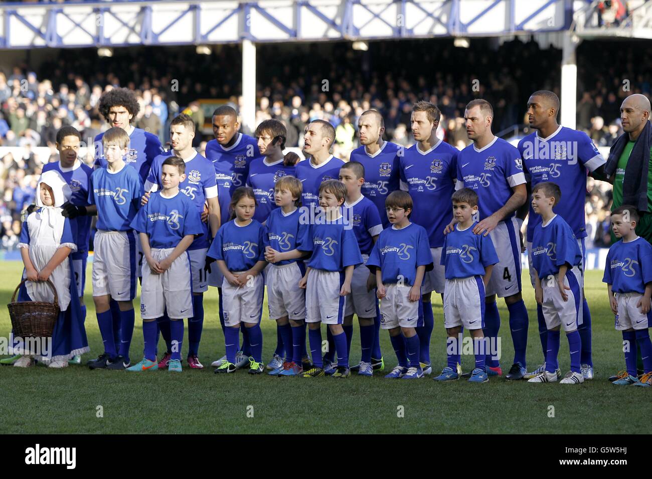 Everton players line up before the game wearing specially commissioned ...