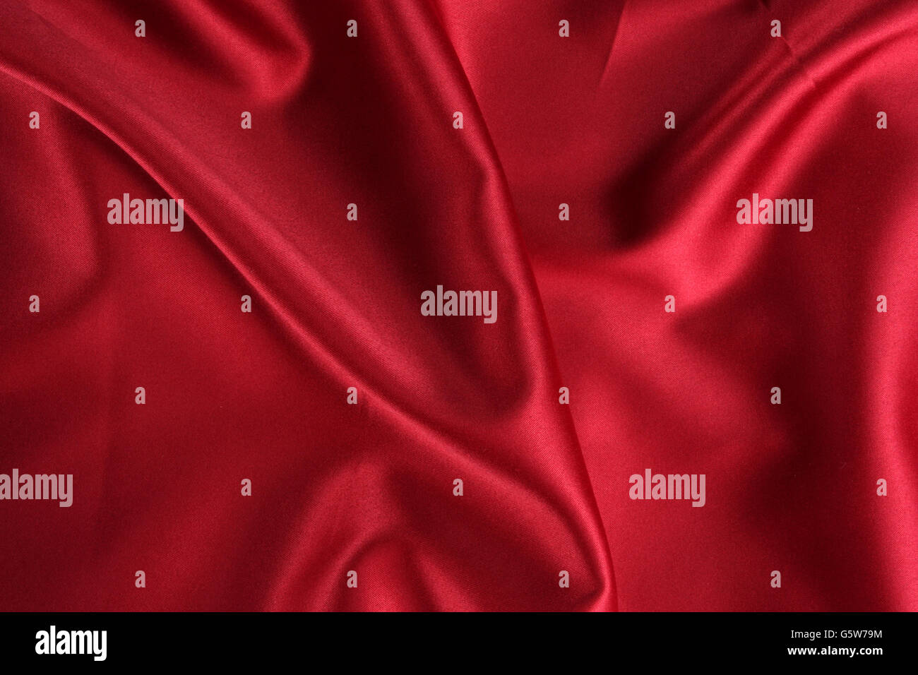 A background of a crumpled red satin cloth Stock Photo - Alamy
