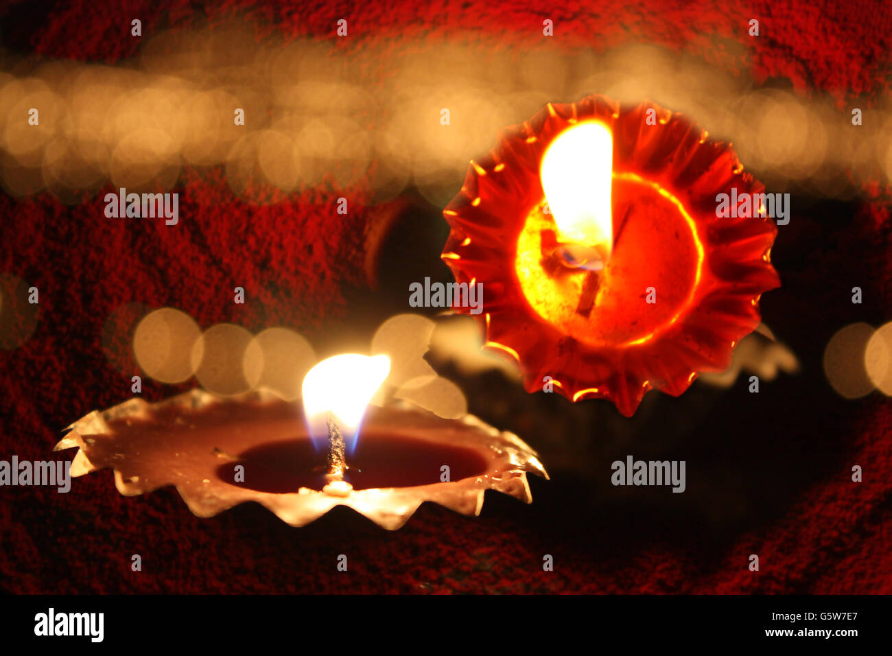 An abstract background of Diwali lamps in top view and side view ...