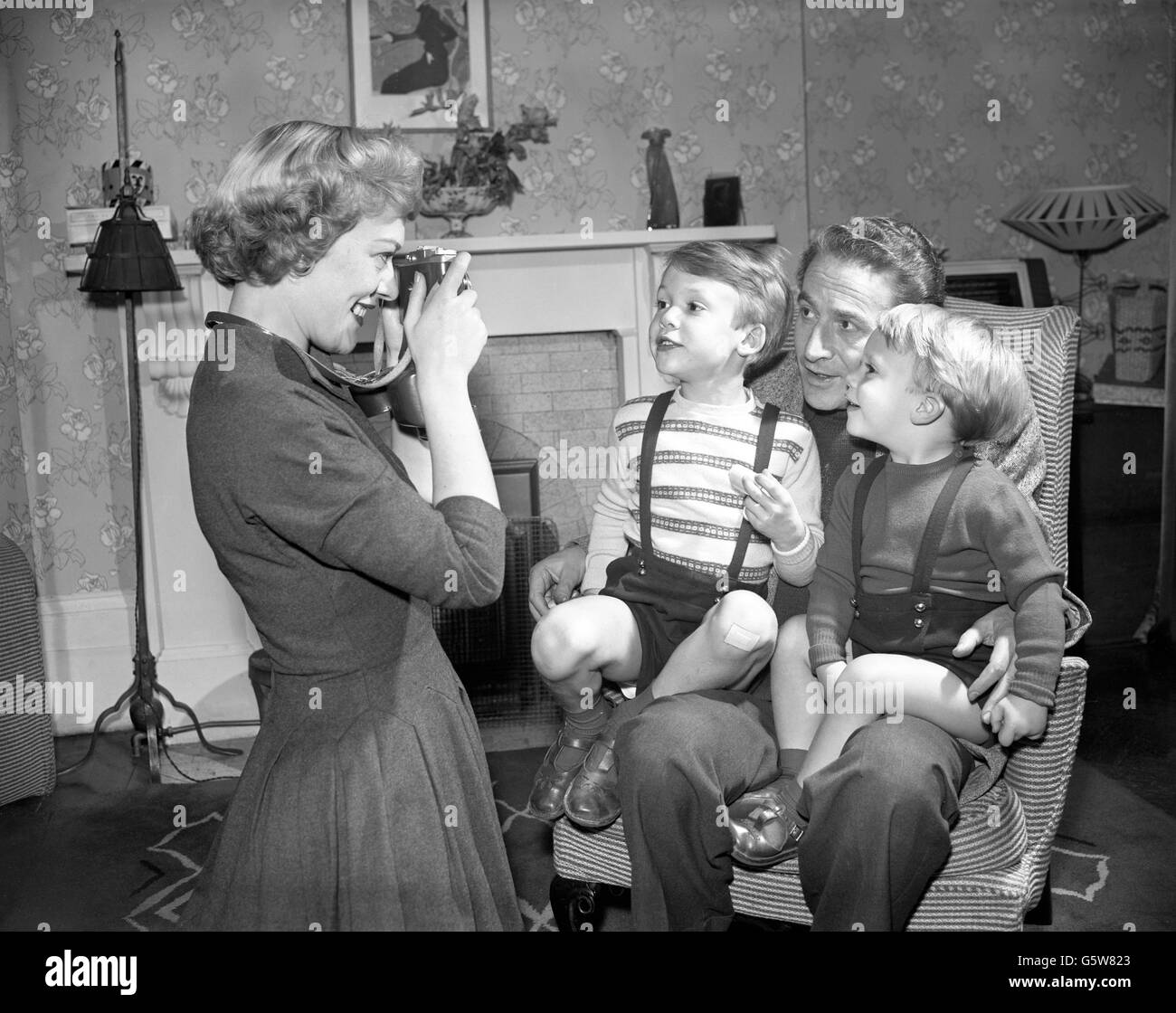 Actress Eleanor Summerfield takes a picture of her husband Leonard ...