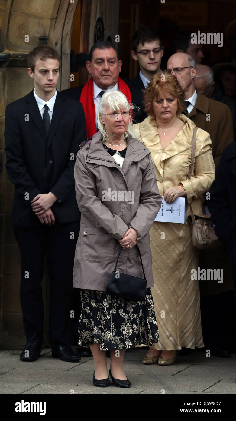 Maureen Greaves, front centre, wife of Alan Greaves, 68, watches her ...
