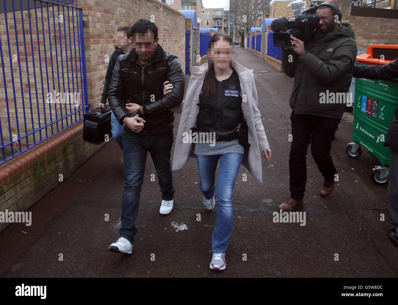 Removing a badge hi-res stock photography and images - Alamy