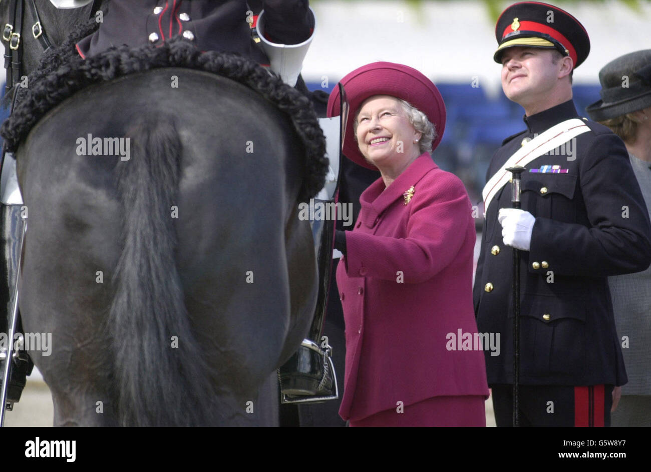 Queen Elizabeth II, with Regimental Corporal Major Mark Kitching ...