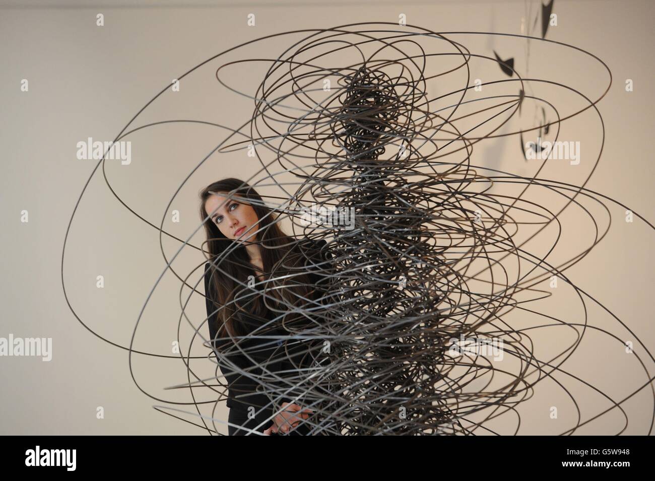 A Christies employee looks at Antony Gormley's 'Feeling Material XIV ...