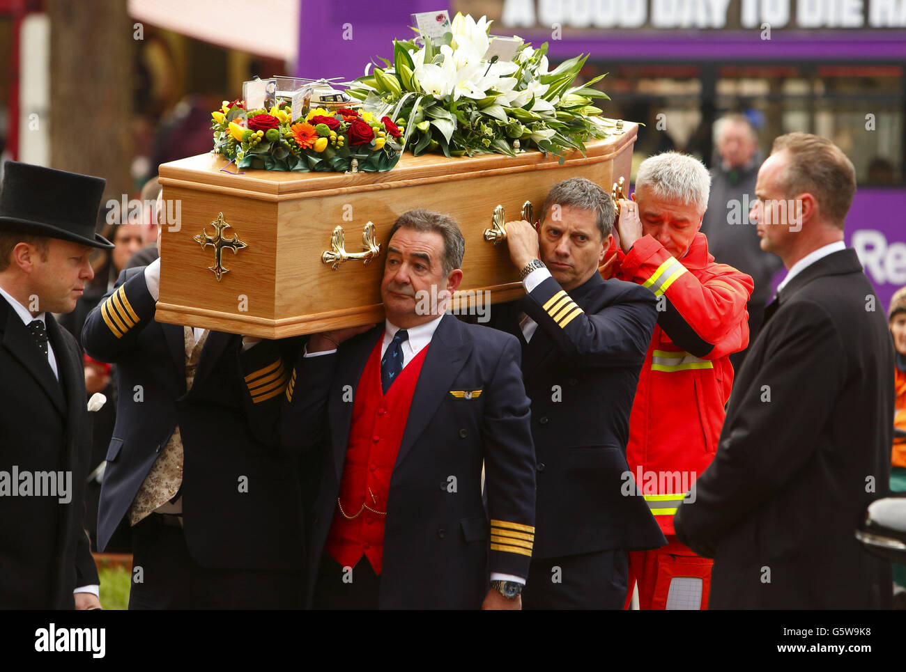 Pilots carry the coffin of helicopter pilot Pete Barnes 50, who died ...