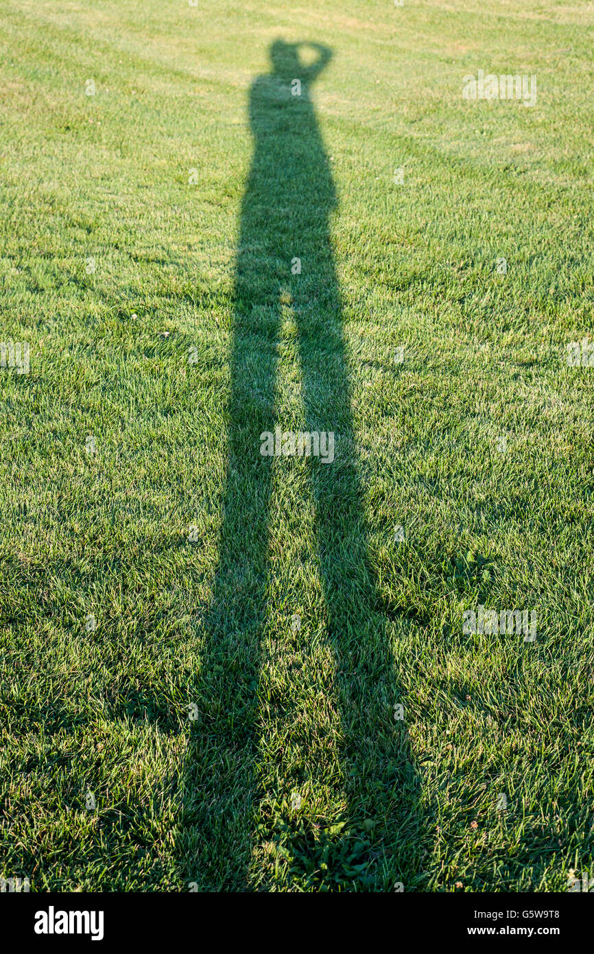 Long shadows on the grass hi-res stock photography and images - Alamy