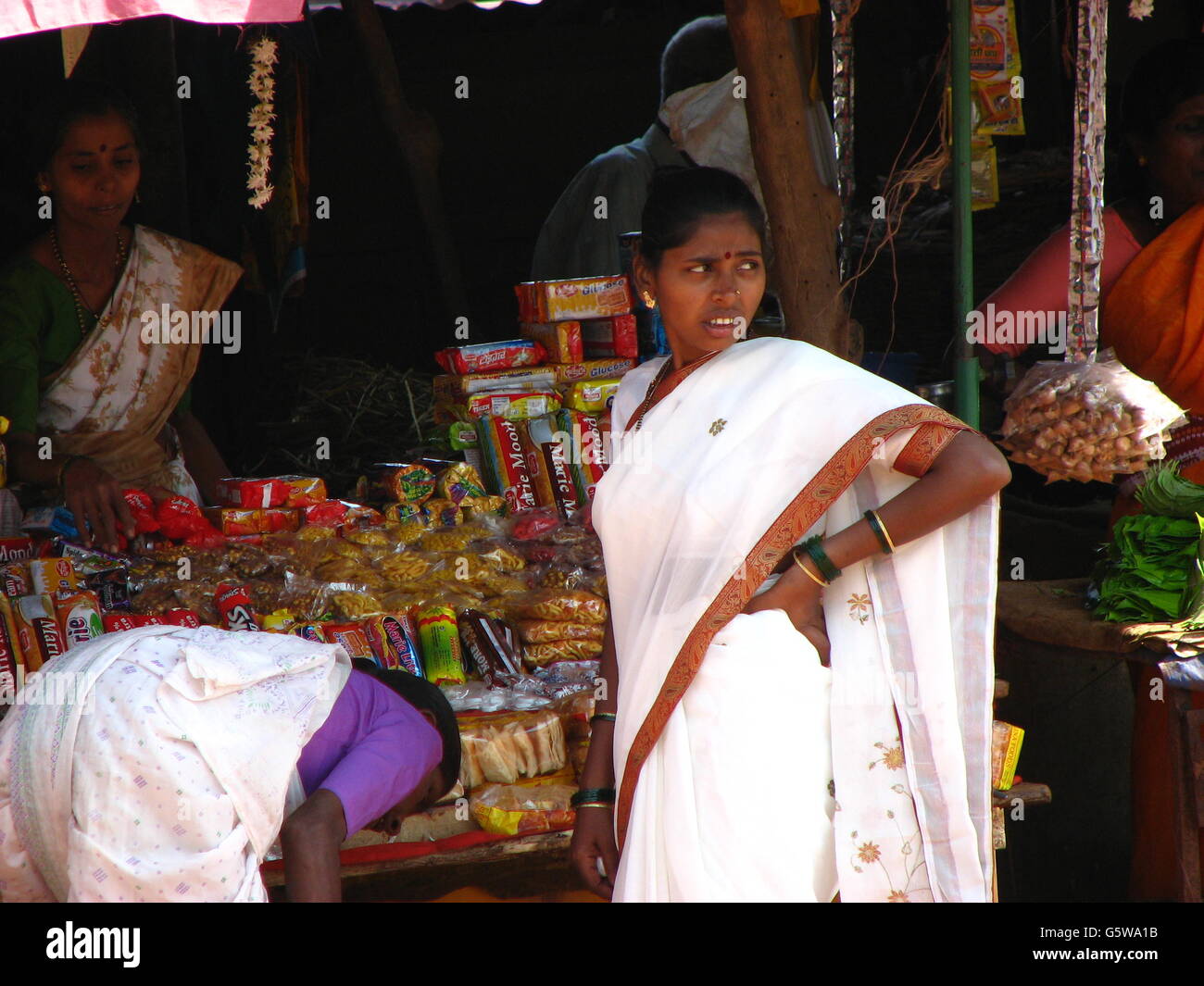 Women shopping in an Indian village shop Stock Photo - Alamy