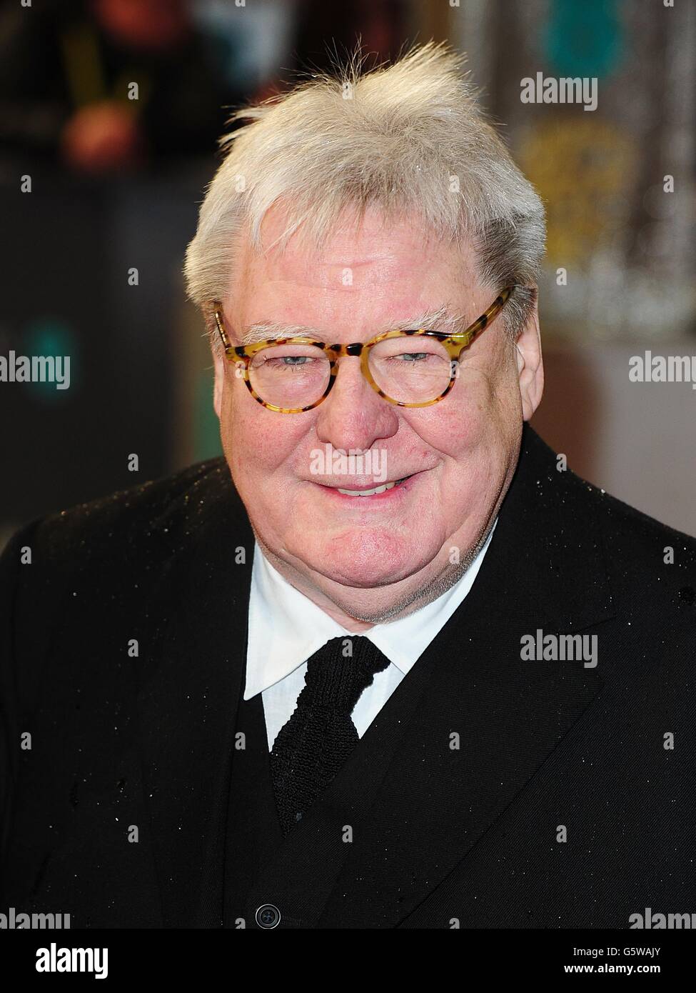Alan Parker arriving for the 2013 British Academy Film Awards at the ...