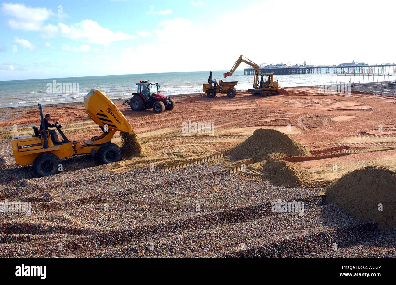 Gets transformed with 400 tonnes of sand hi-res stock photography and ...