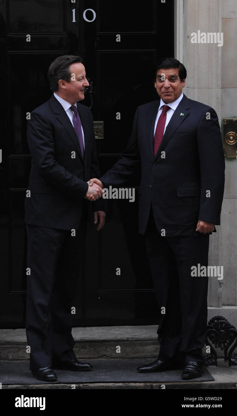 Britain's Prime Minister David Cameron, shakes hands with Pakistan's ...