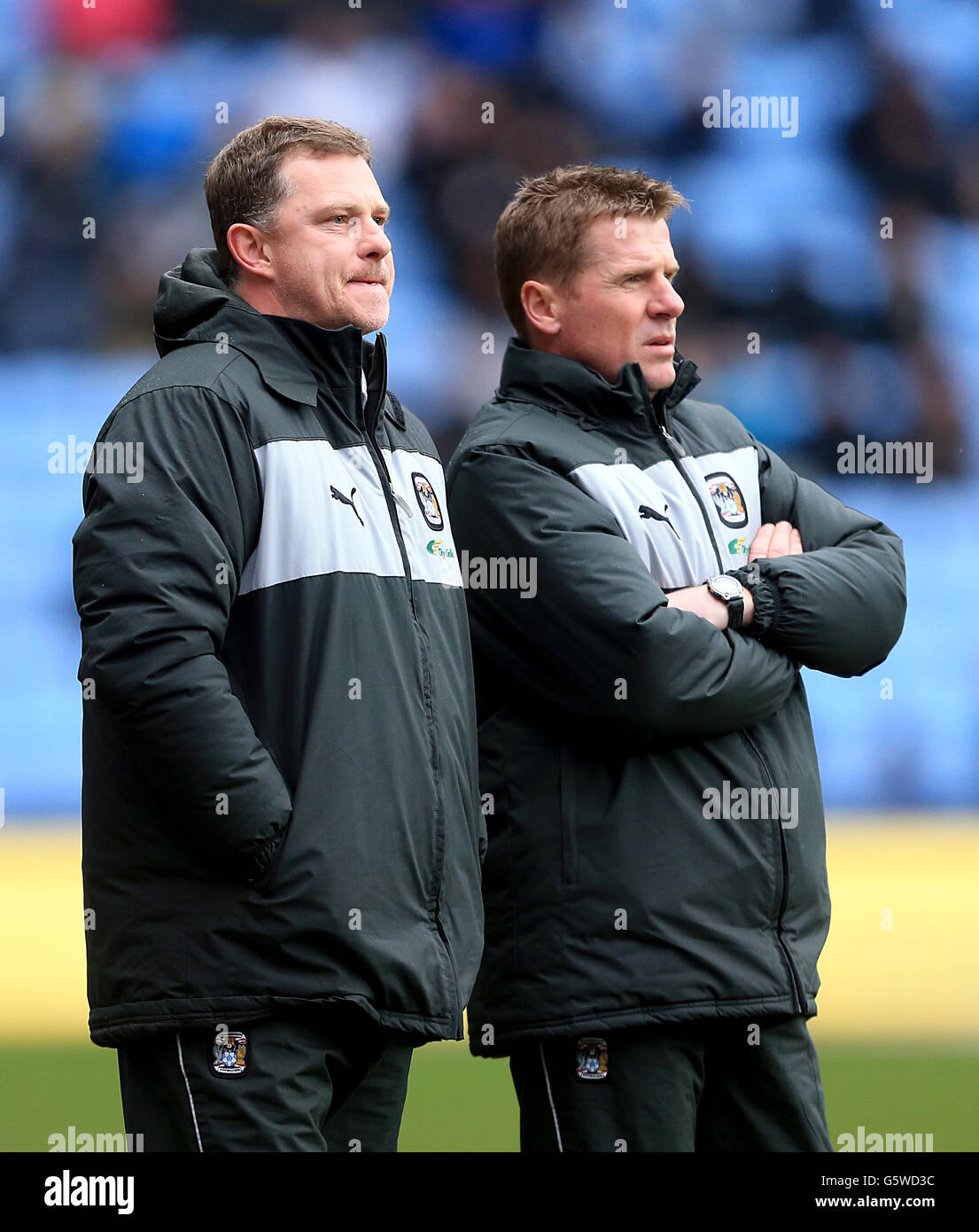 Coventry City manager Mark Robins (left) and first team coach Steve ...