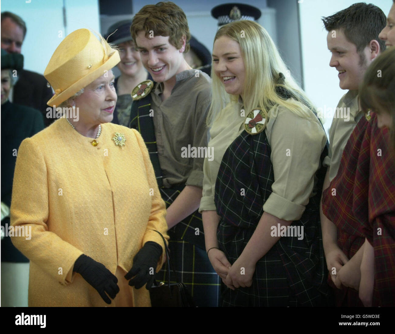 Britain's Queen Elizabeth II meets a dance group at 'The Space' in The ...