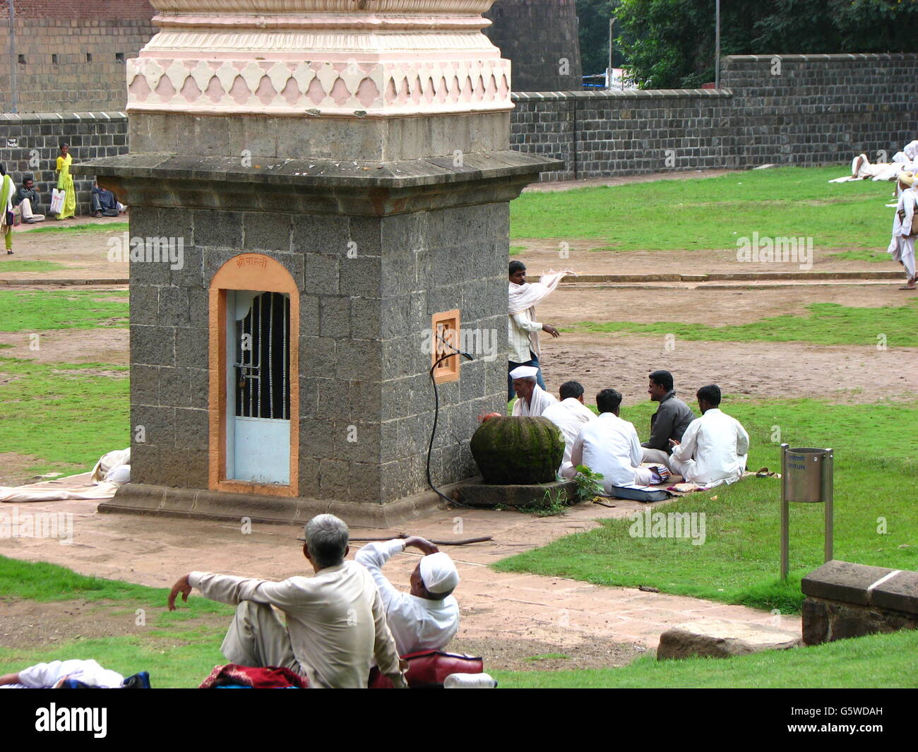 Pilgrims resting around a temple in India Stock Photo - Alamy
