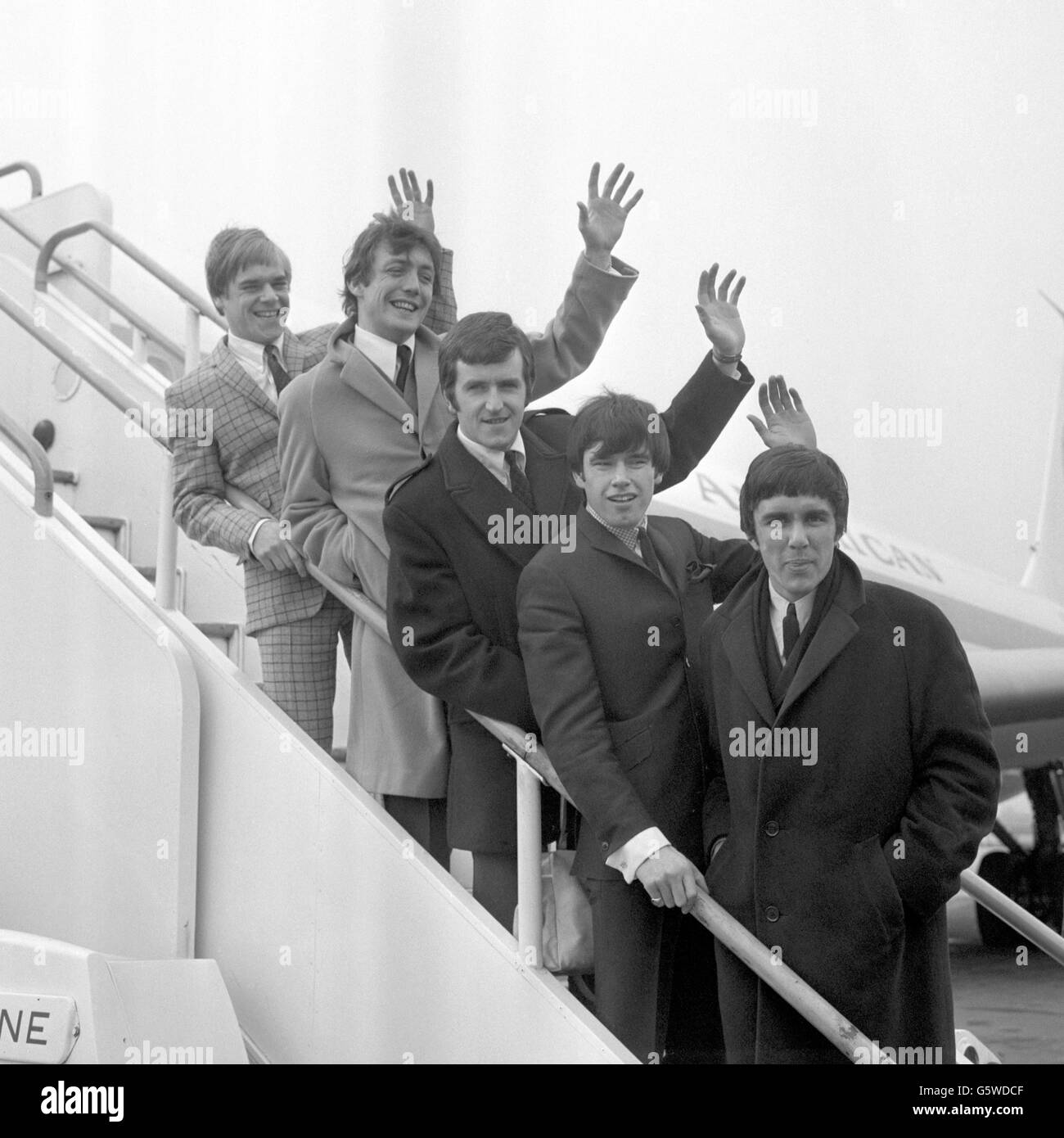 The Dave Clark Five pose on the steps of a plane as they leave London ...