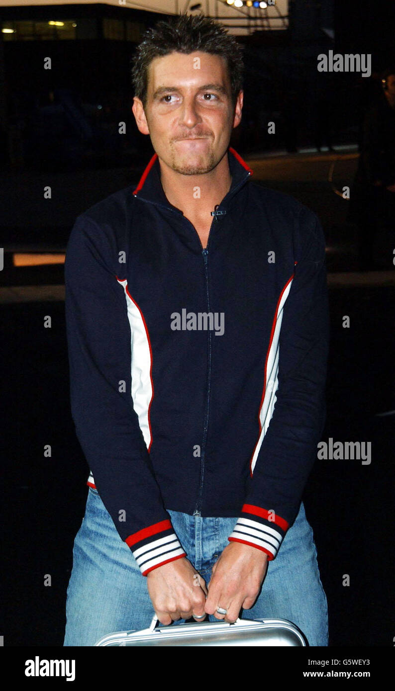 Big Brother 3 contestant Jonny, entering the Big Brother house in ...