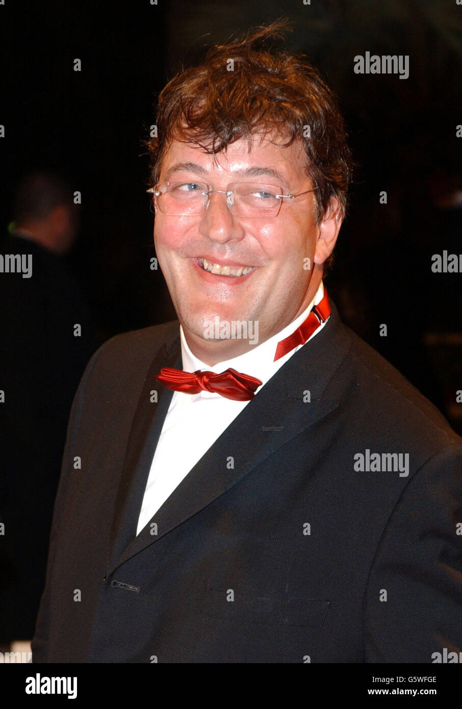 Writer and actor Stephen Fry arrives for the premiere of '24 Hour Party ...