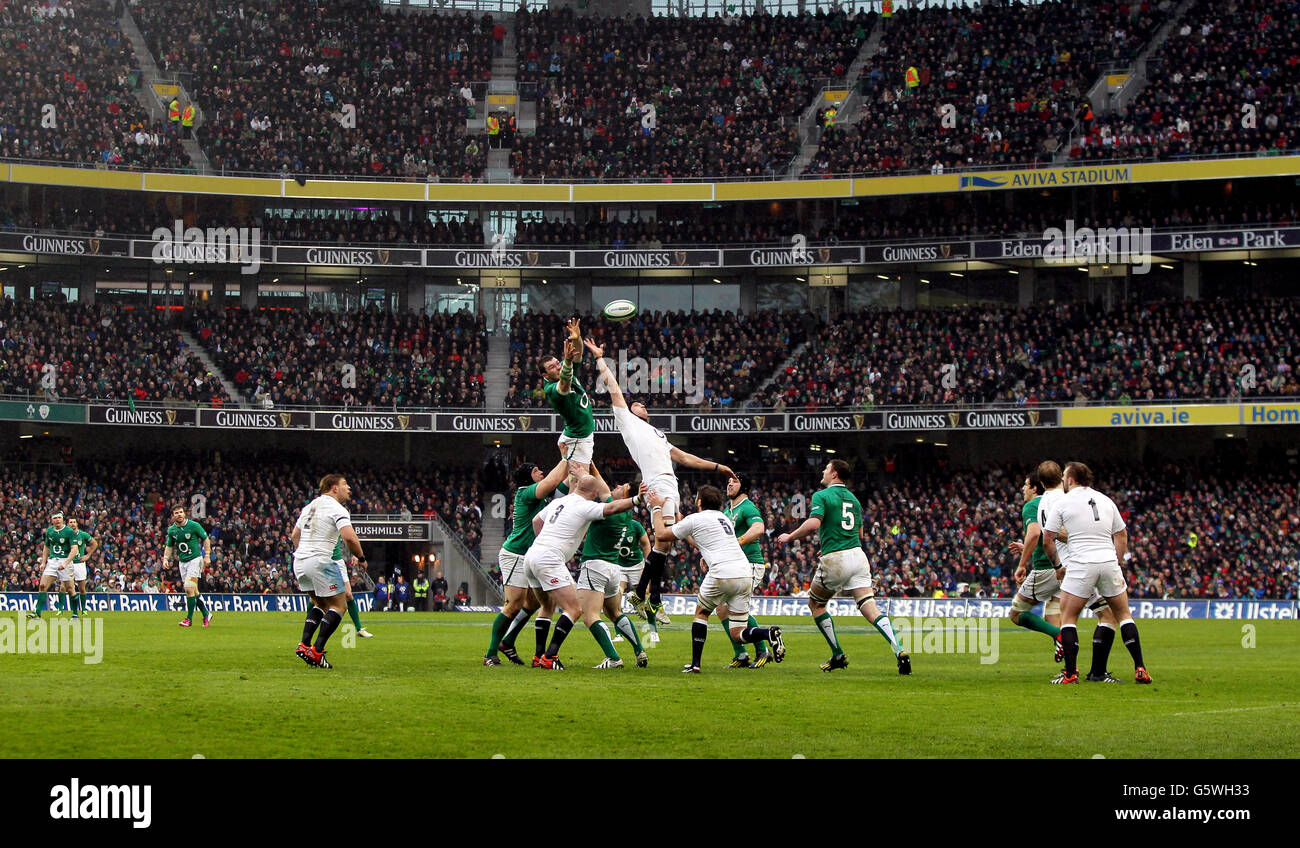 Ireland's Donnacha Ryan contests a lineout with Tom Wood of England ...