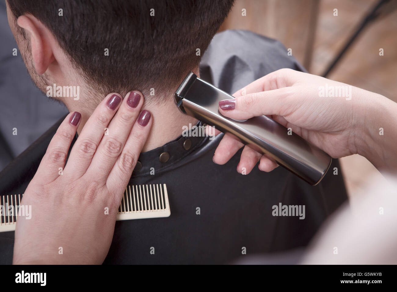 Handsome man in hairdressing saloon Stock Photo - Alamy