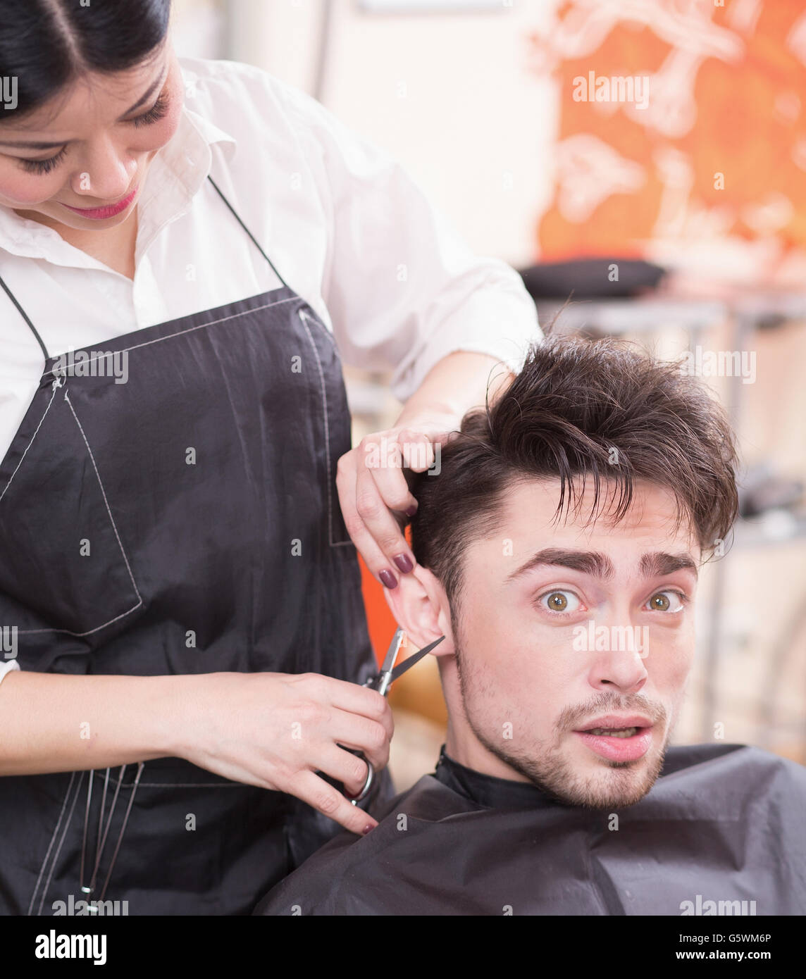 Handsome man in hairdressing saloon Stock Photo - Alamy