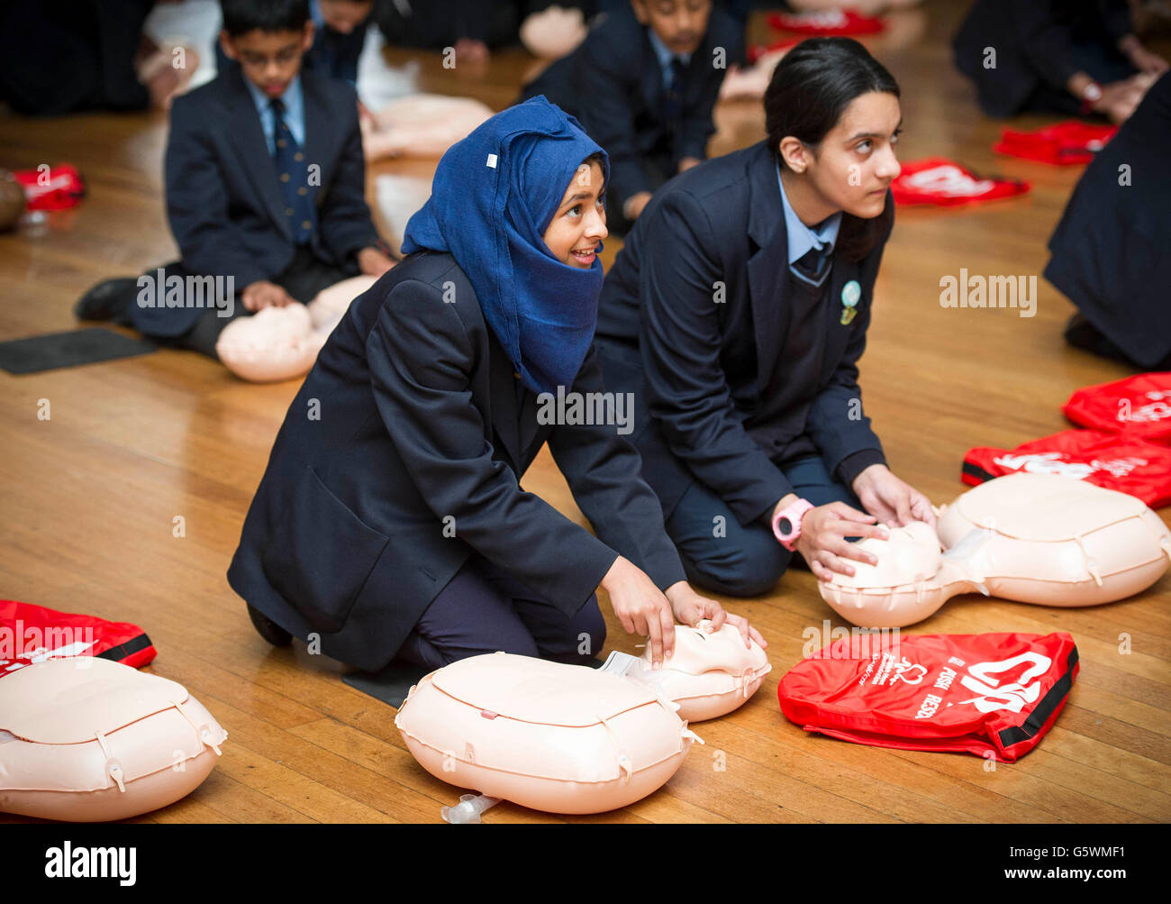 EDITORIAL USE ONLY Children from the Seven Kings Secondary School in ...