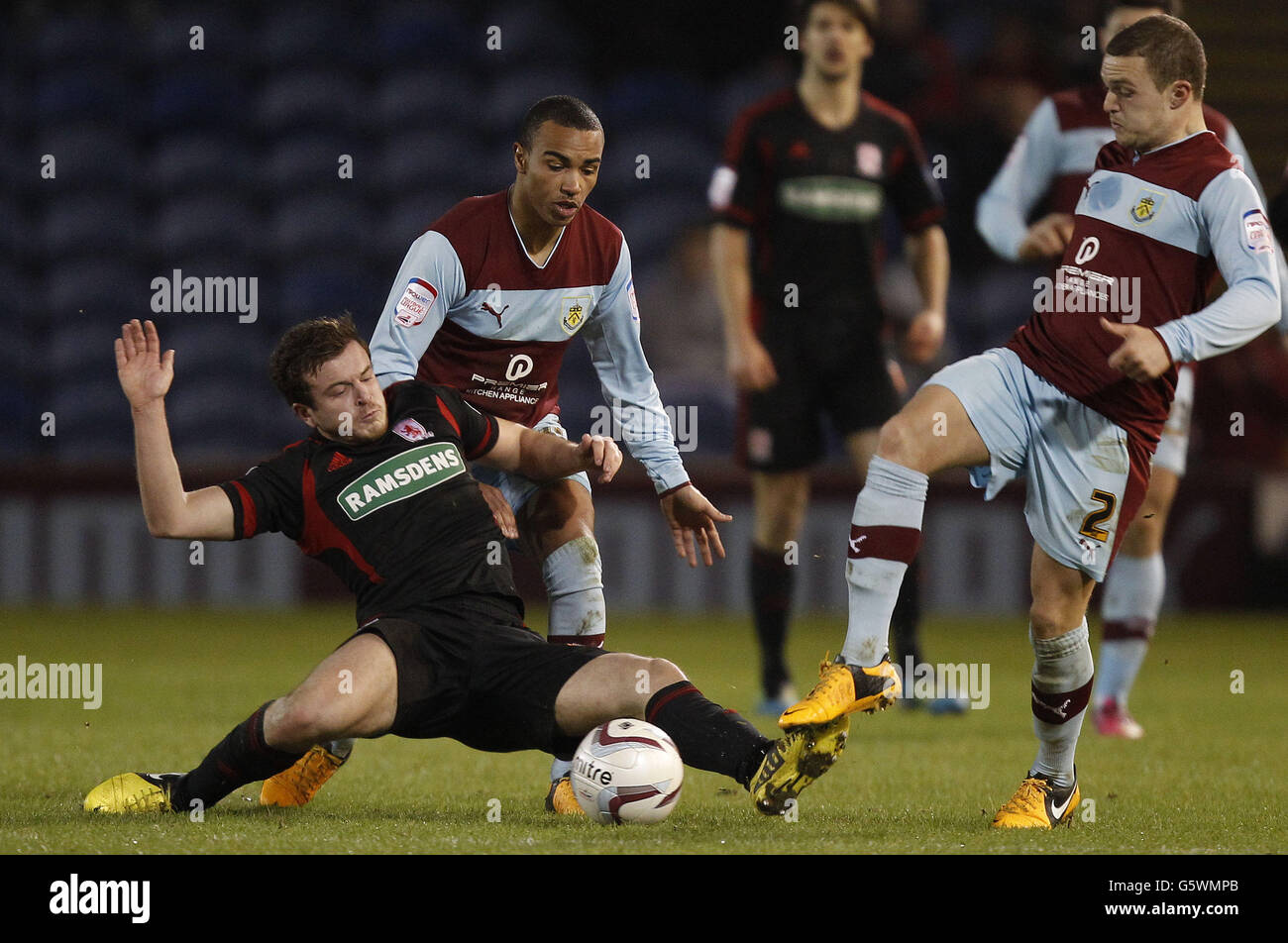 Middlesbrough's Andrew Halliday (left) challenges Burnley's Kieran ...