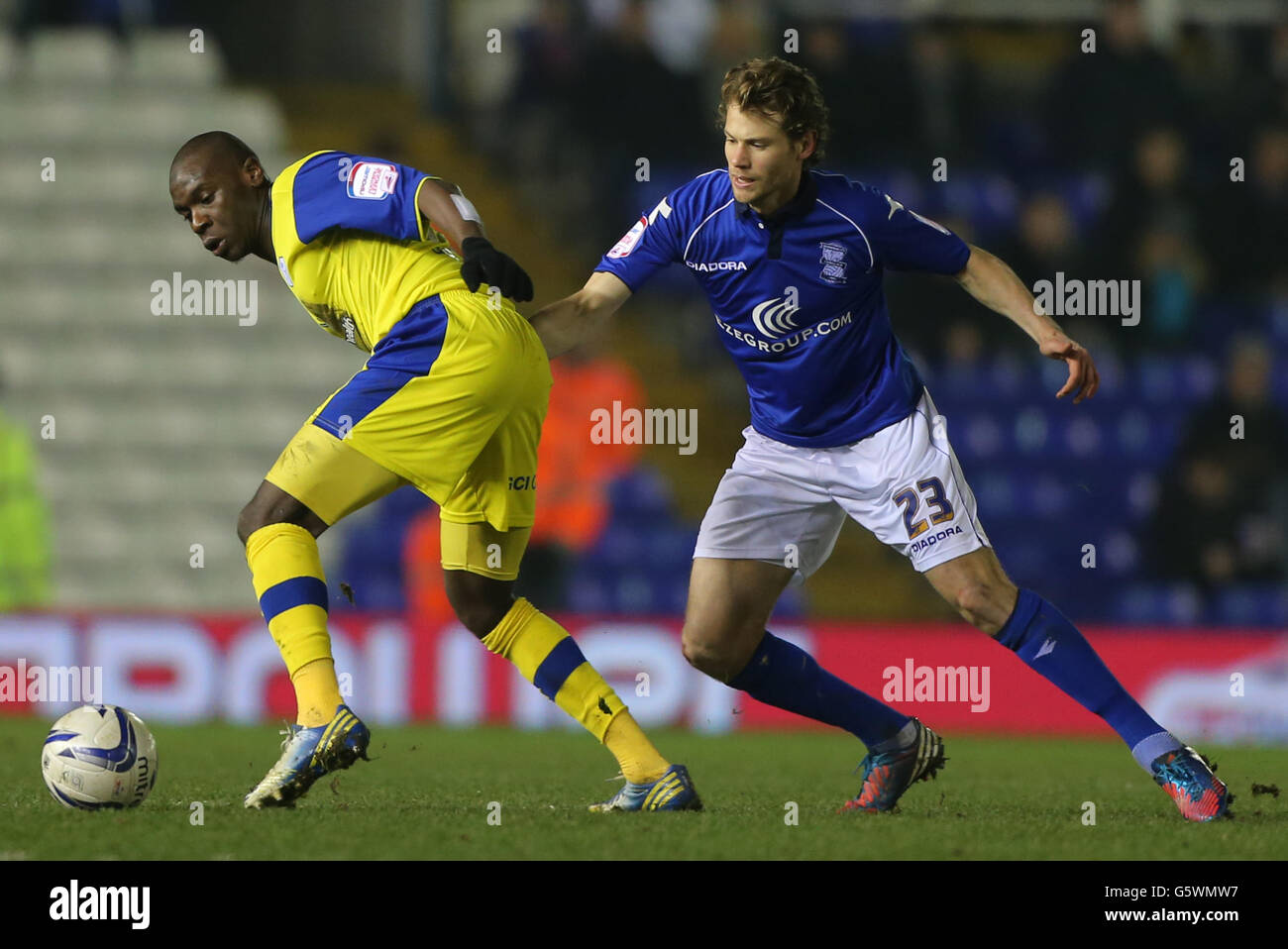 Birmingham City's Jonathan Spector tussles with Sheffield Wednesday's ...