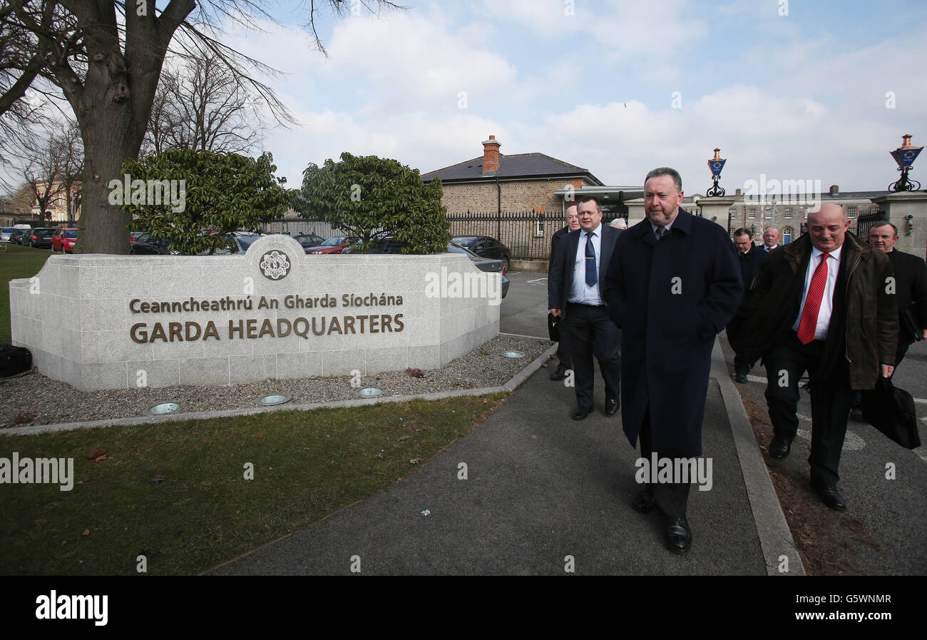PJ Stone (centre) leads members of the Garda Representative Association ...