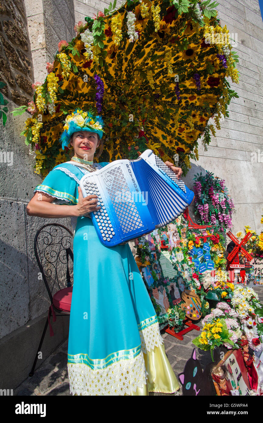 Lady with accordion playing music performance at Montmartre, Paris ...