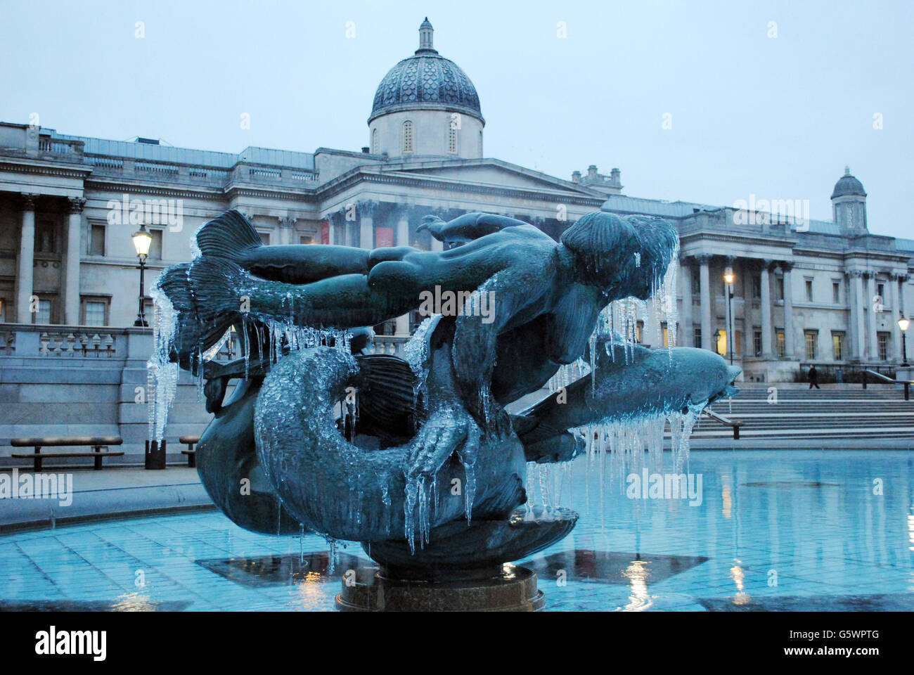 A frozen statue in Trafalgar Square in central London this morning as ...