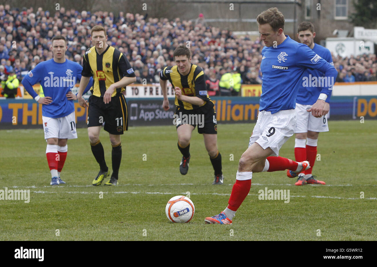 Rangers Dean Shiels scores during the IRN-BRU Scottish Third Division ...