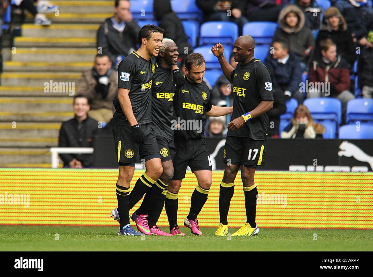 Wigan Athletic's Arouna Kone (second left) celebrates scoring their ...