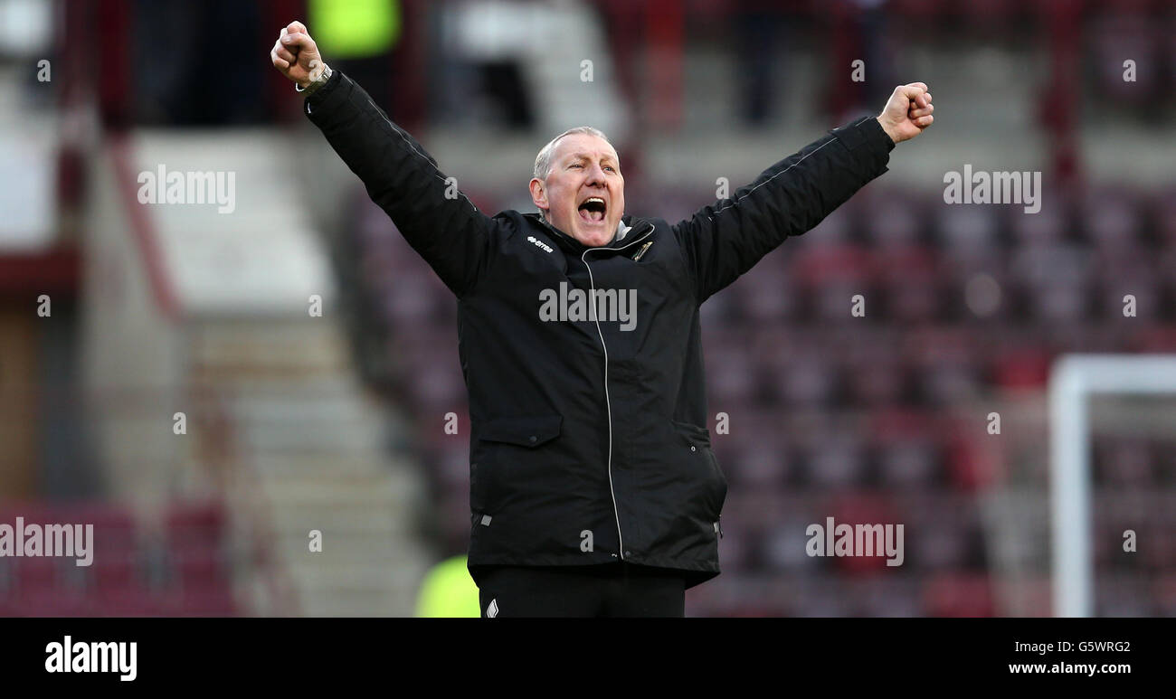 Inverness' manager Terry Butcher celebrates winning during the ...