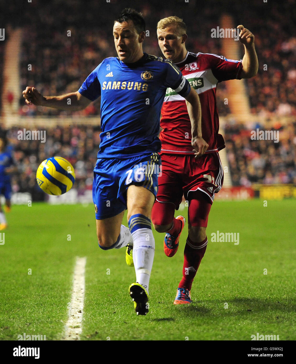 Chelsea's John Terry (left) and Middlesbrough's Curtis Main battle for ...