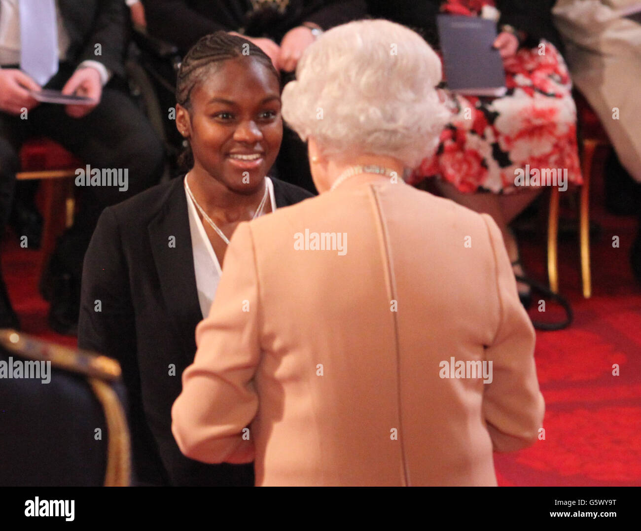 Nicola Adams receives her Member of the British Empire (MBE) medal from ...