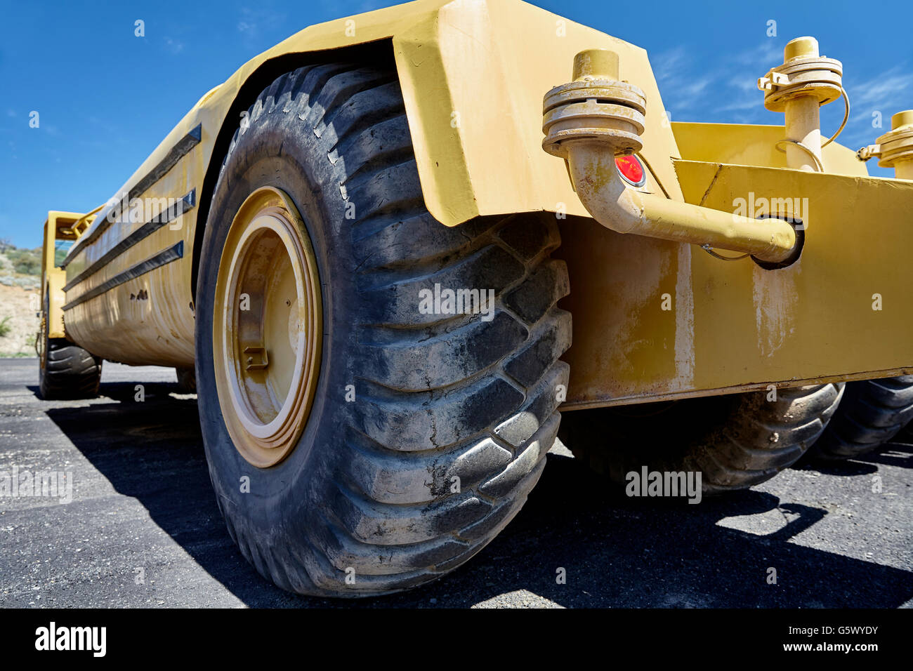 Heavy equipment water tanker industrial tires Stock Photo - Alamy