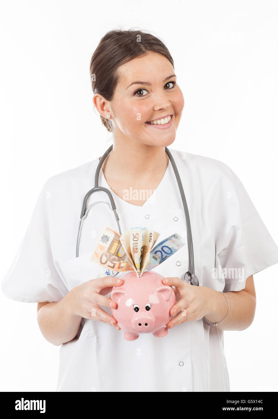 happy woman doctor with piggy bank full of money Stock Photo - Alamy