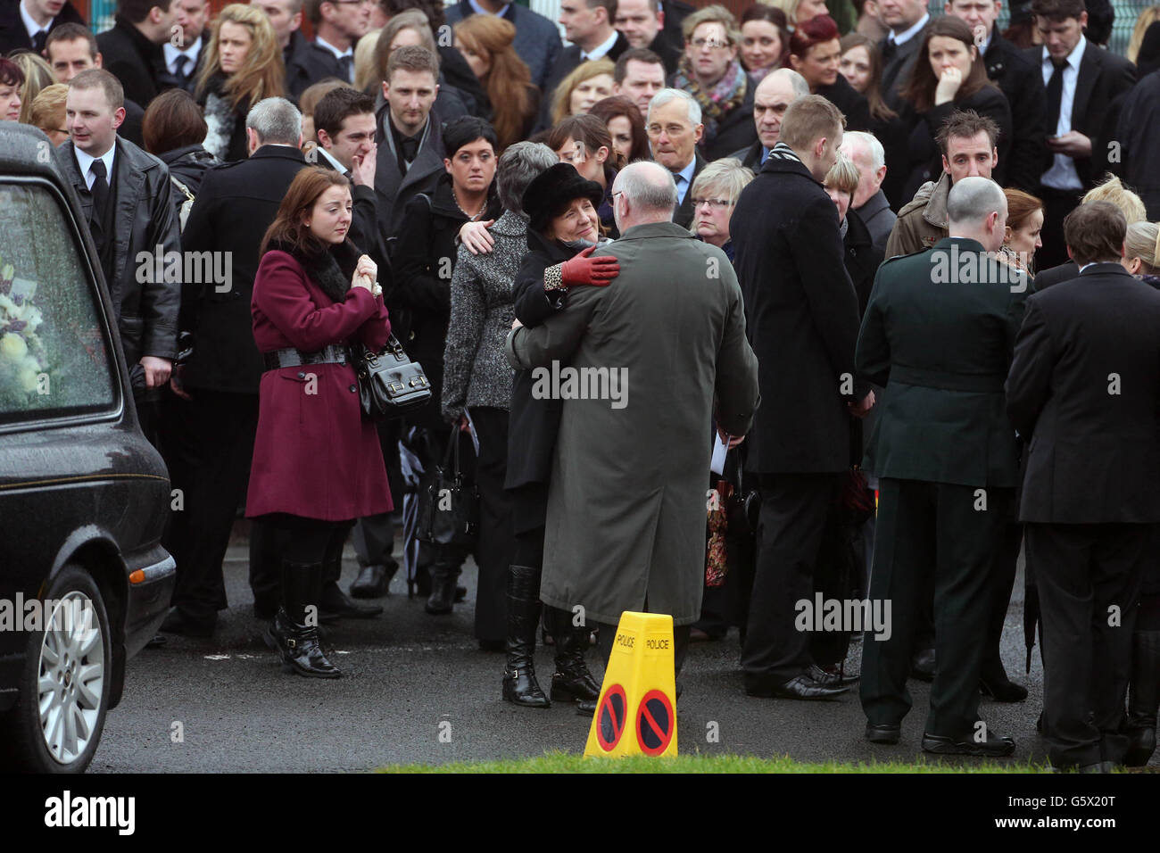 Mervyn is comforted at the funeral of his daughter Constable Philippa ...