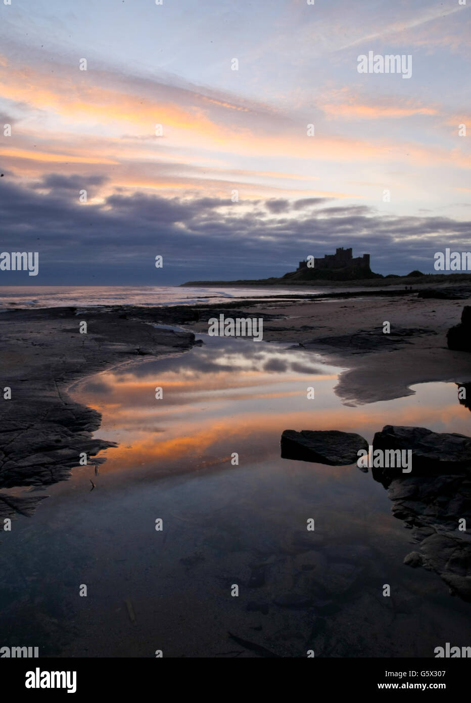 STANDALONE PHOTO. Sunrise over Bamburgh Castle, Northumberland. PRESS ...