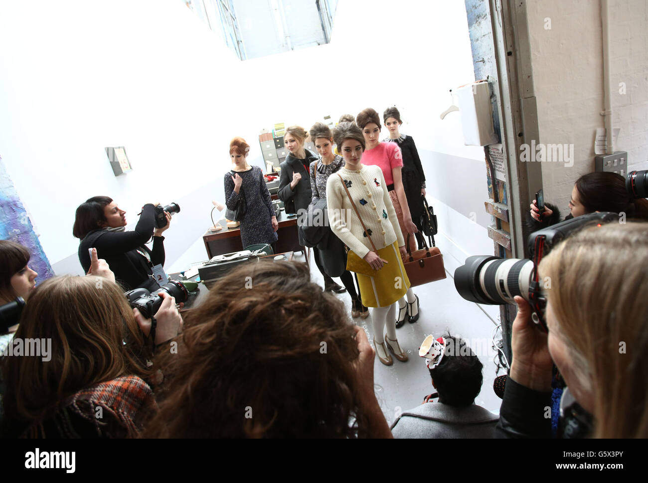 Models on the catwalk during the Orla Kiely Autumn/Winter 2013 London ...