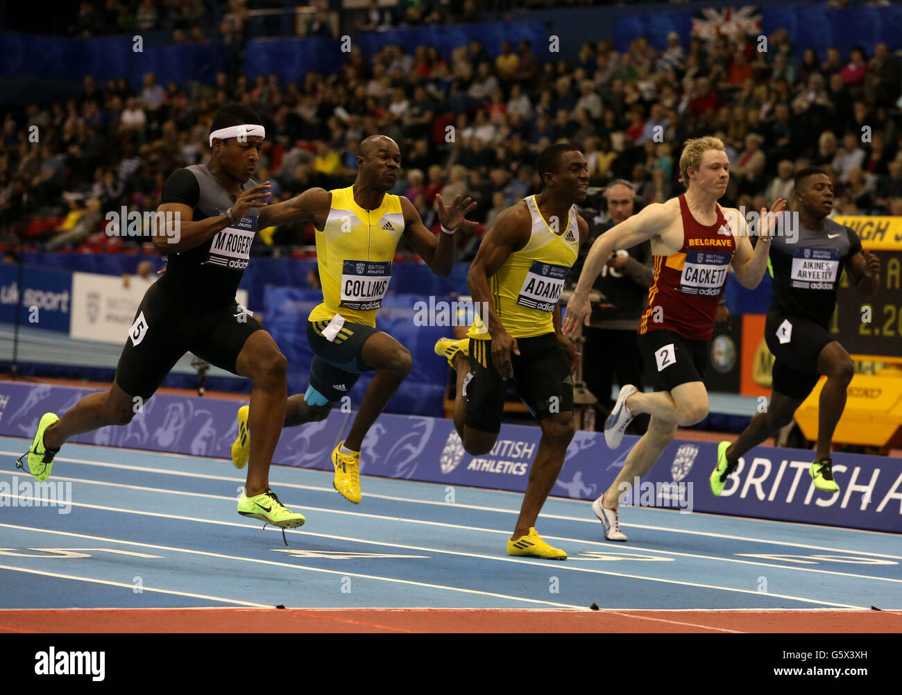 USA's Michael Rodgers (left) wins the mens 60metre final with his ...